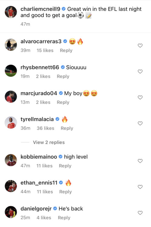 Tyrell Malacia congratulates Charlie McNeill on impressive u21 display