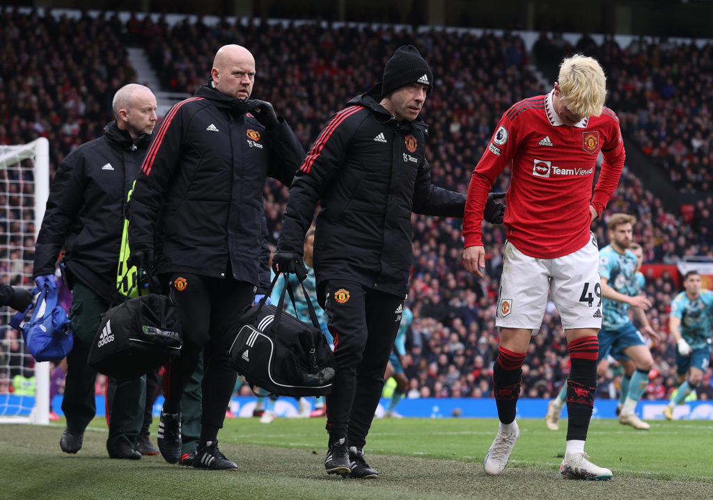 Alejandro Garnacho pictured in walking boot leaving Old Trafford