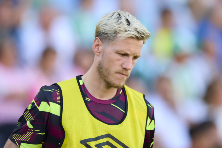 New look Wout Weghorst poses with shirt as he seals move to new club